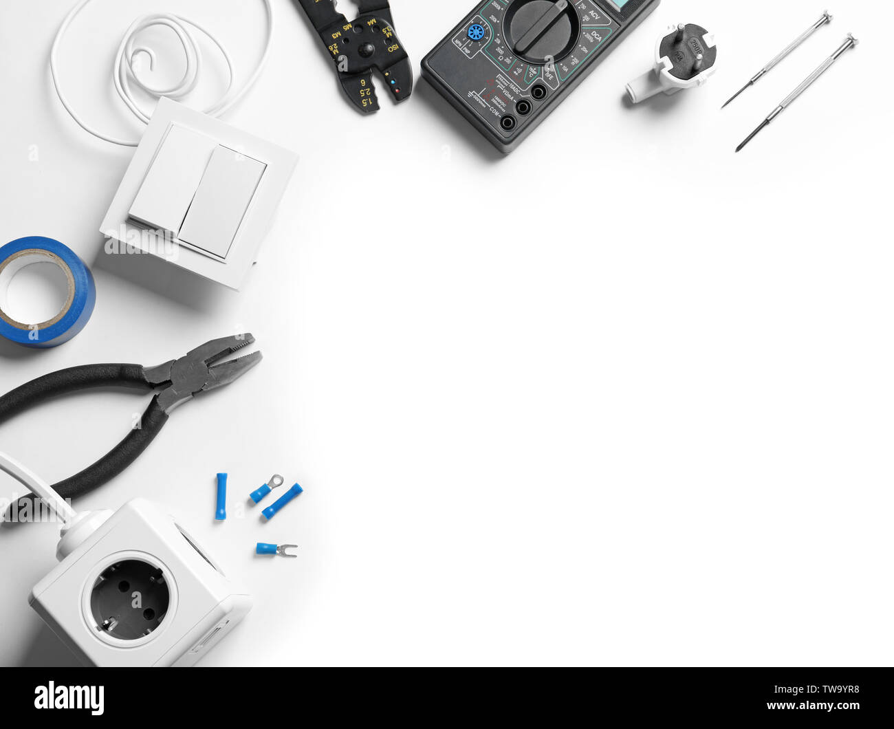 Different electrical tools on white background Stock Photo - Alamy