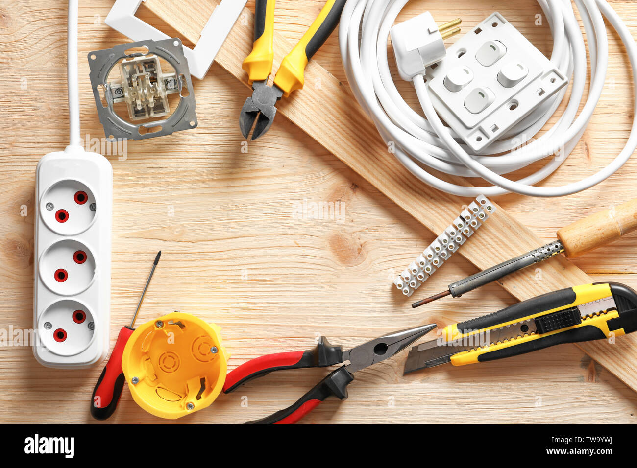 Different electrical tools on wooden background Stock Photo - Alamy