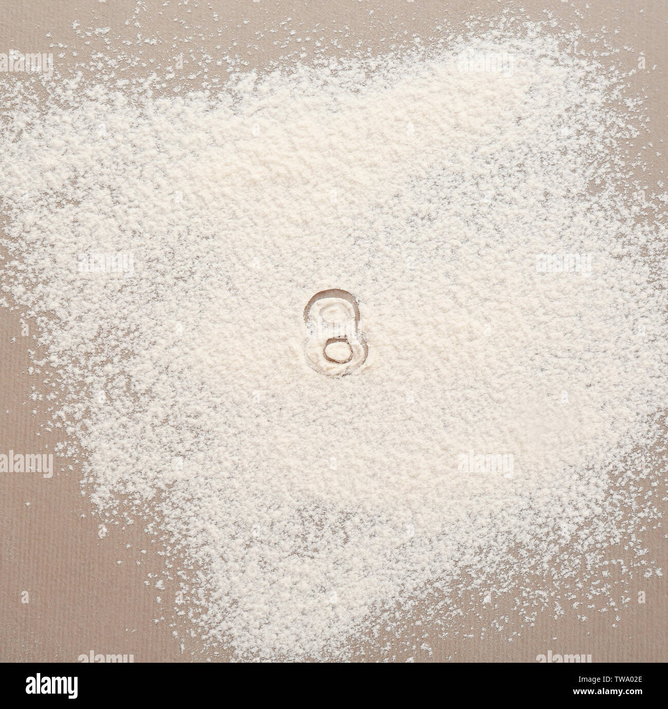 Silhouette of figure 8 on scattered flour Stock Photo - Alamy