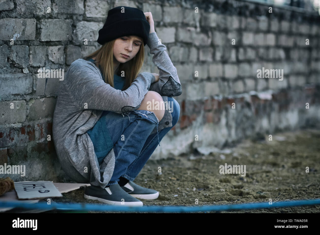Poor teen hi-res stock photography and images - Alamy