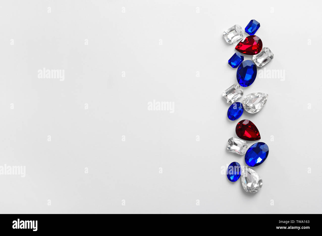 Precious jewels on white background Stock Photo - Alamy
