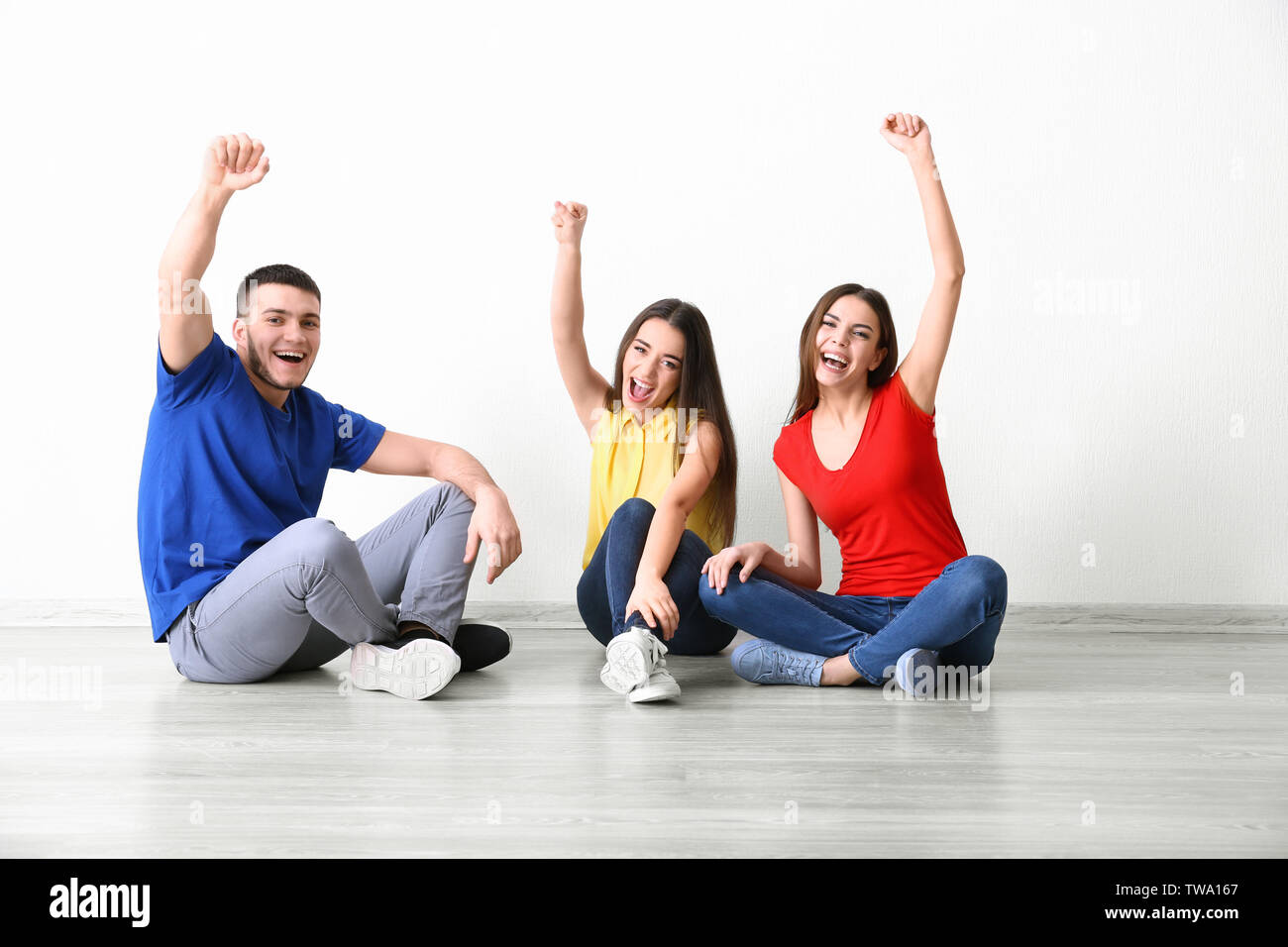 Young people posing together indoors. Unity concept Stock Photo - Alamy
