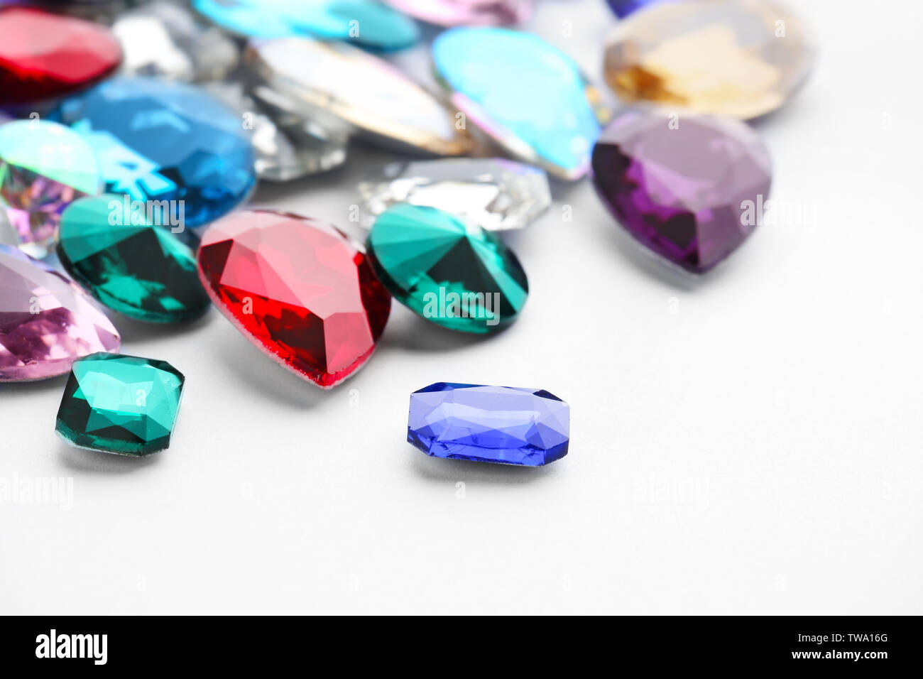 Precious jewels on white background Stock Photo - Alamy