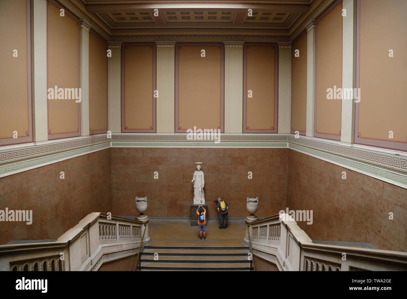 A child photographs the marble Roman statue, the Townley Caryatid, on ...