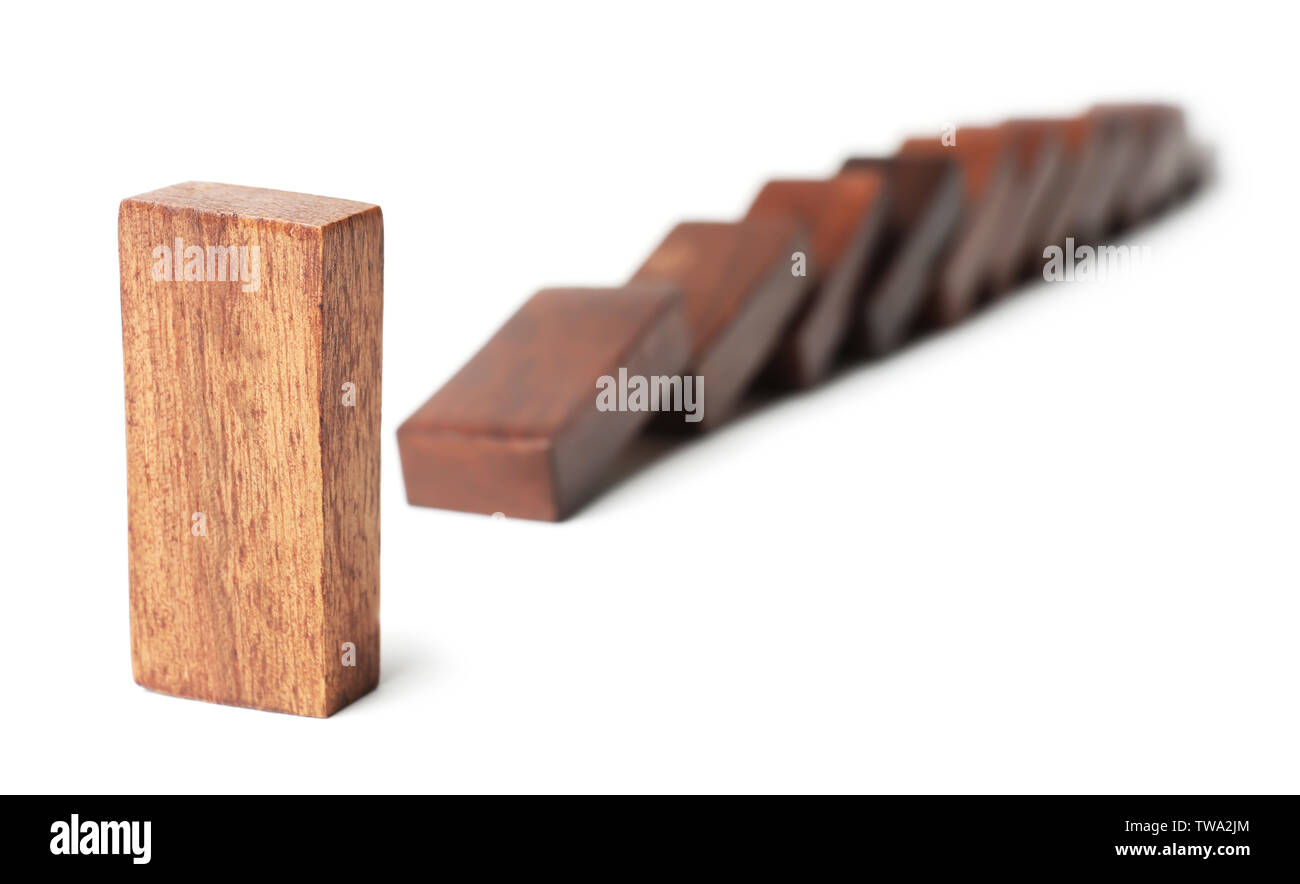 One domino standing out from others on white background. Think ...