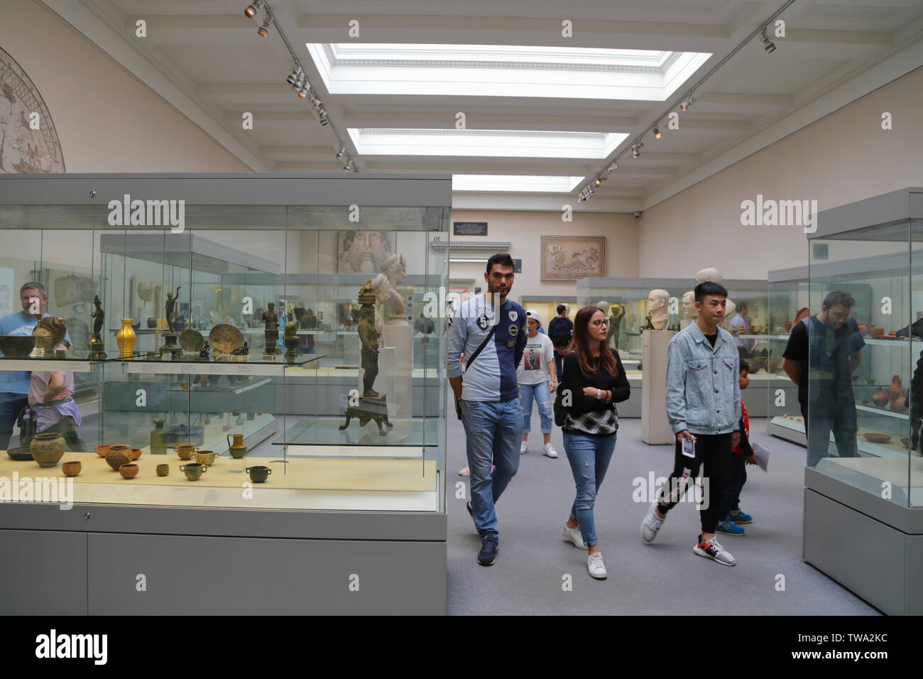 People look at the ancient Roman artefacts on display in Room 70 in the ...