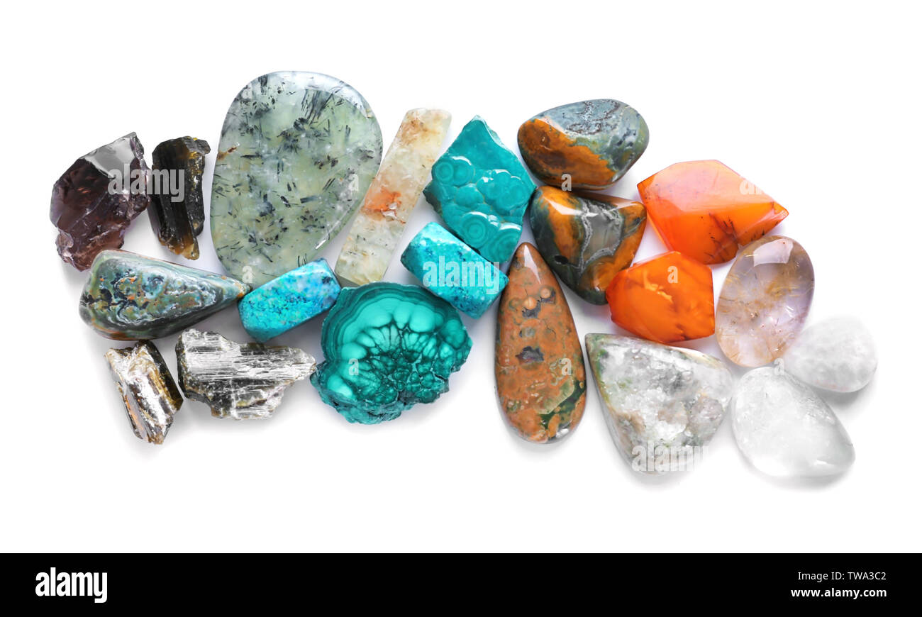 Different natural semi-precious stones for jewellery on white ...