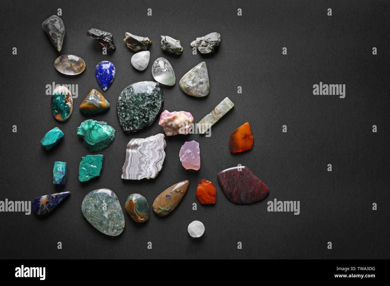 Natural semi-precious stones for jewellery on dark background Stock ...