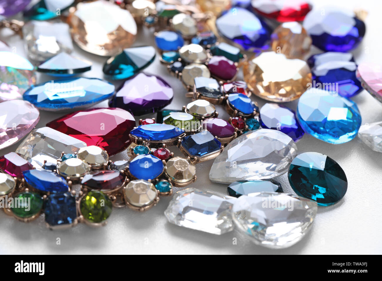 Colorful precious stones for jewellery on white background Stock Photo ...