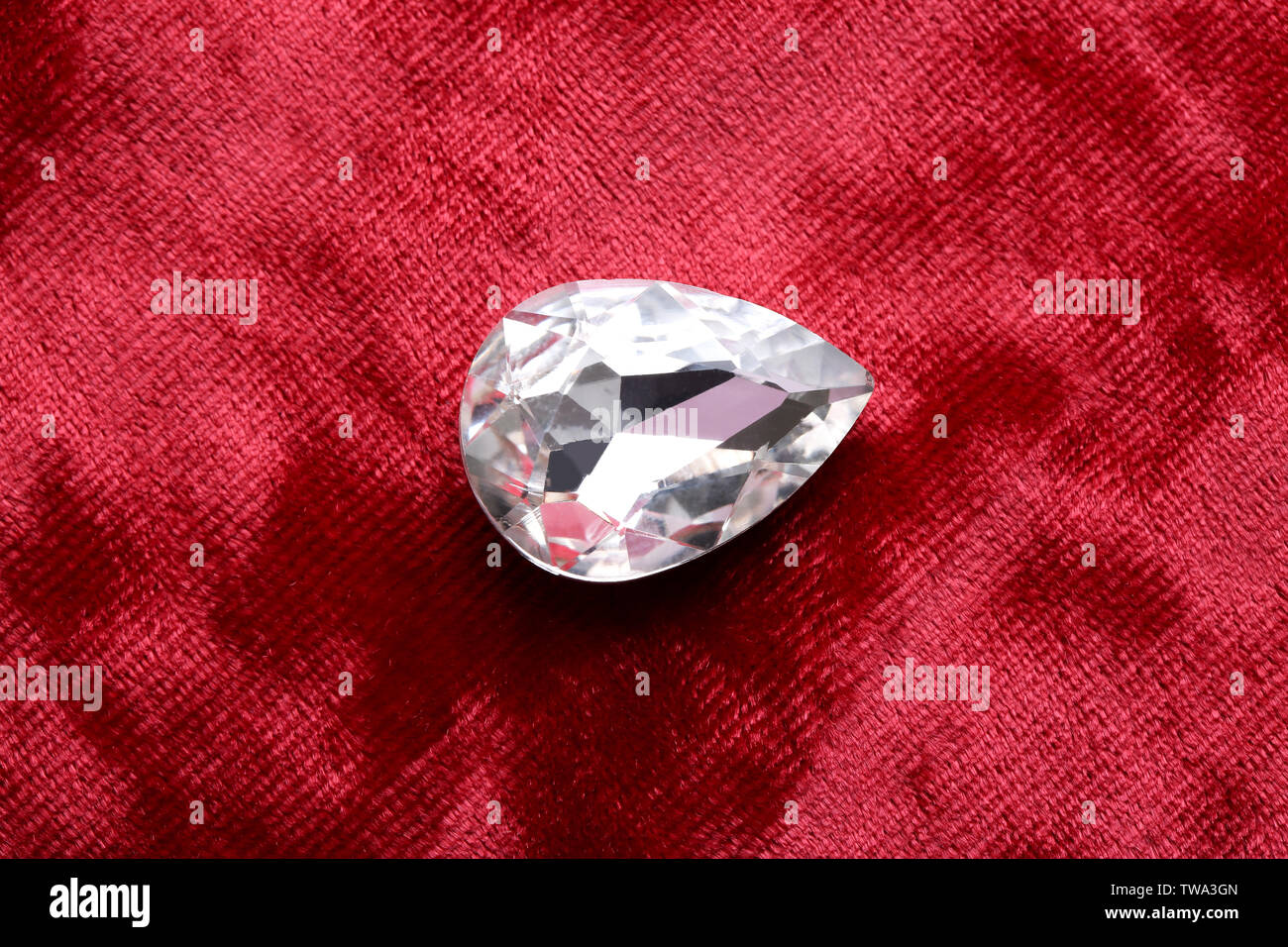Precious stone for jewellery on red velvet Stock Photo - Alamy