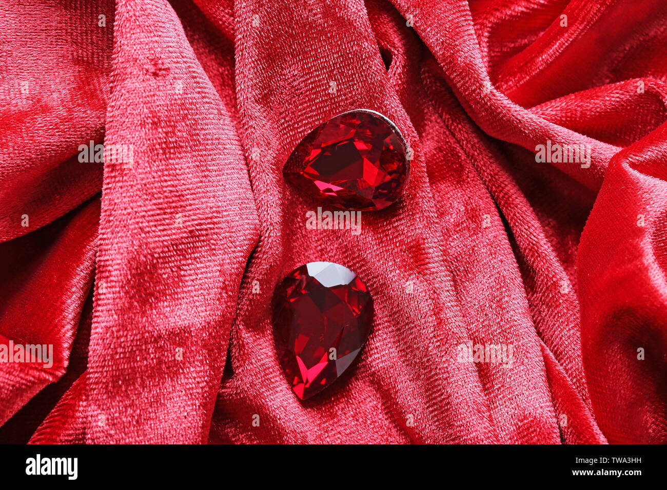 Precious stones for jewellery on red velvet Stock Photo - Alamy