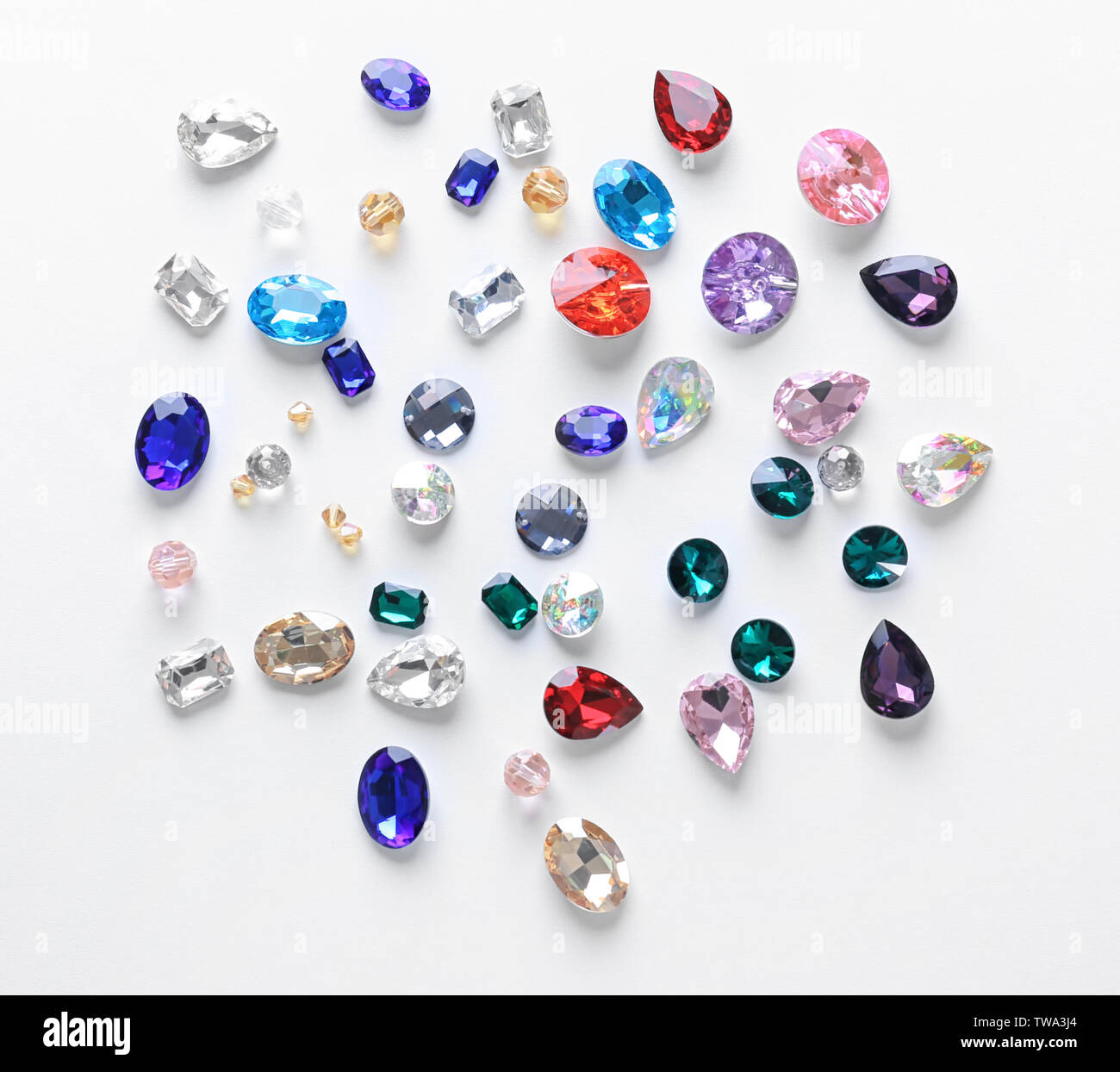 Colorful precious stones for jewellery on white background Stock Photo ...