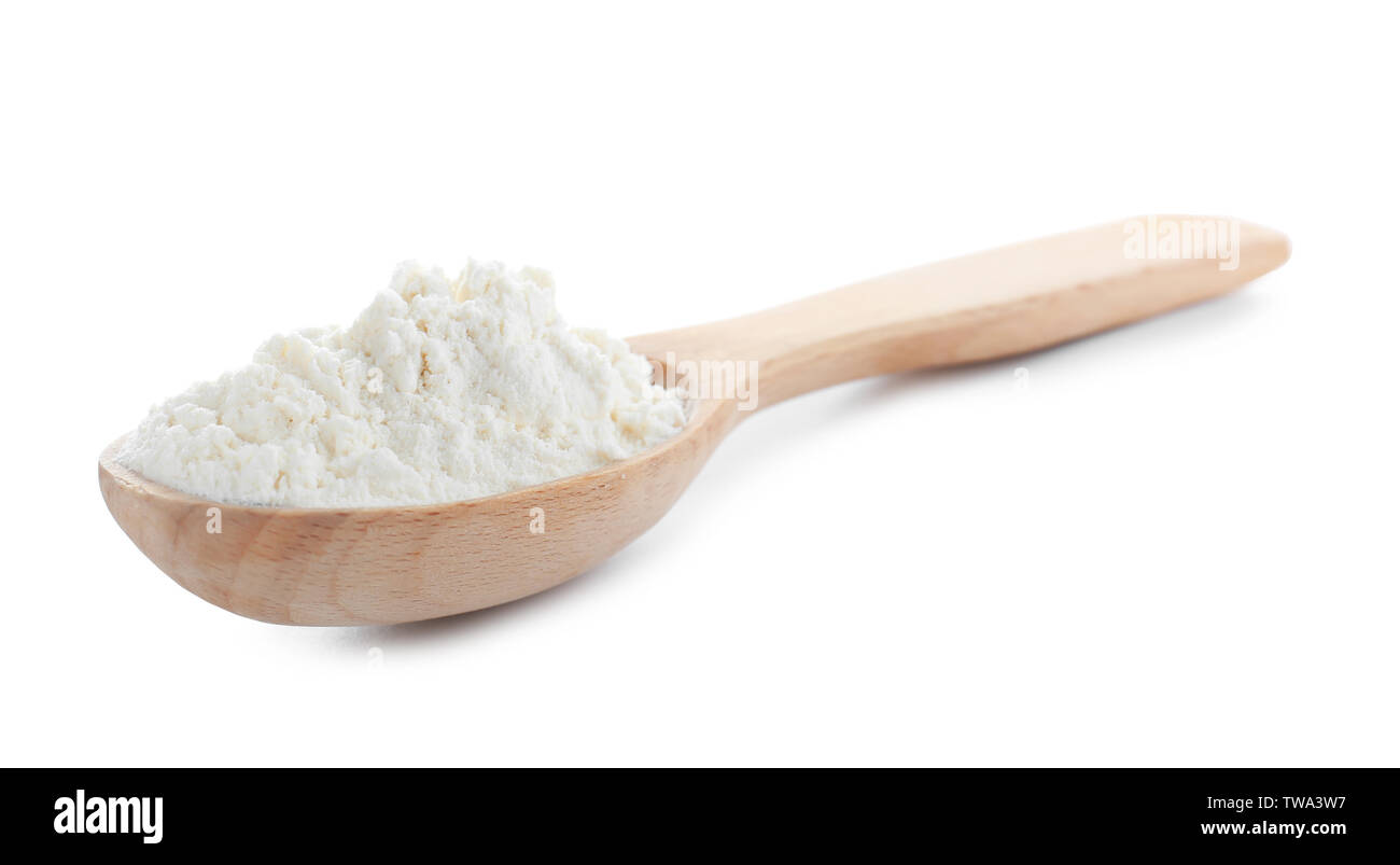Spoon with flour on white background Stock Photo - Alamy