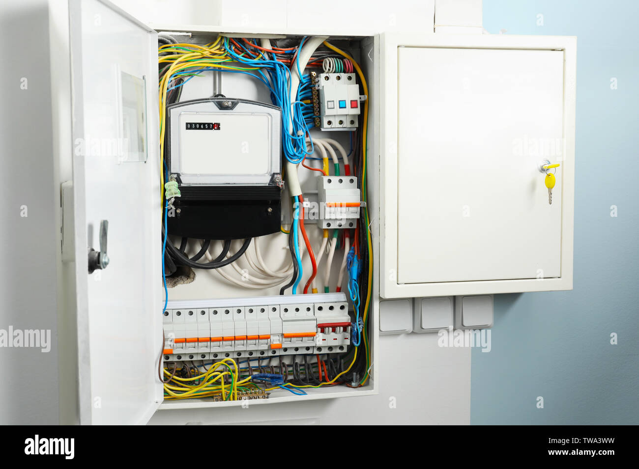 Distribution board on wall indoors Stock Photo - Alamy