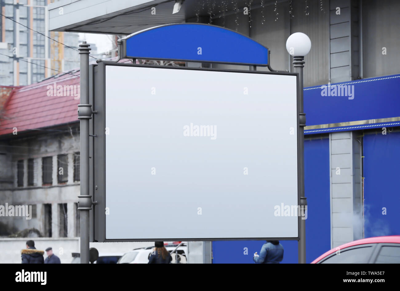 Blank advertising board on city street Stock Photo - Alamy