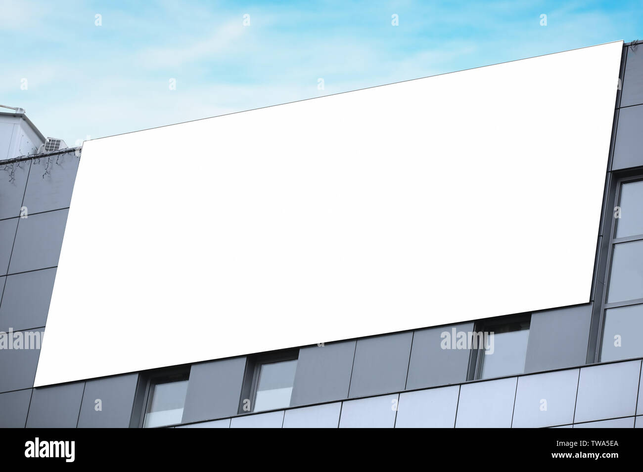 Blank advertising board on city building outdoors Stock Photo - Alamy