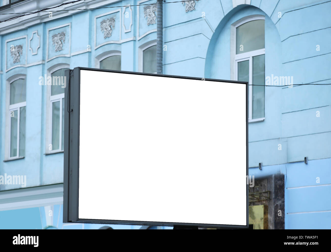 Blank advertising board on city street Stock Photo - Alamy