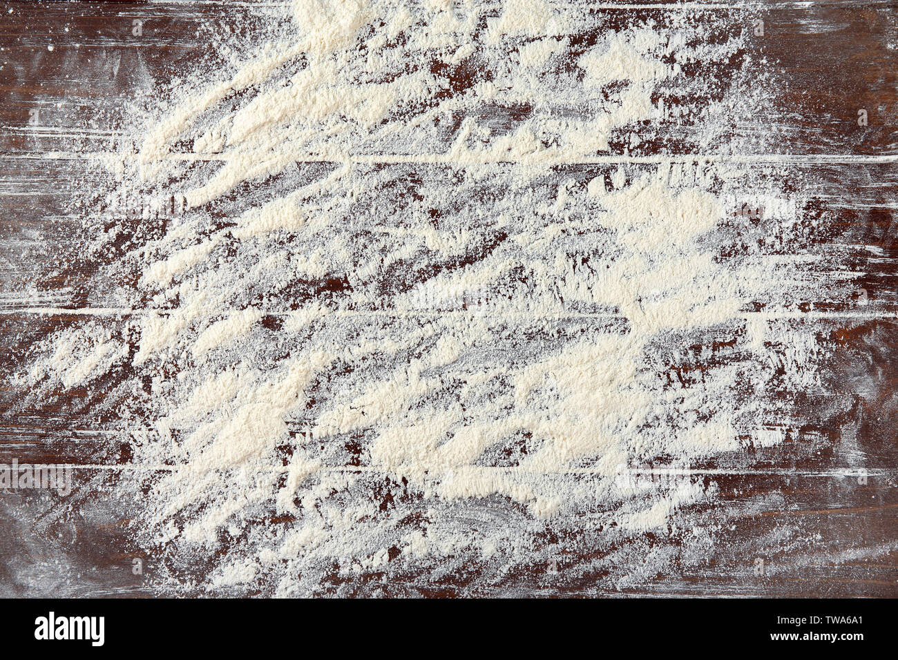 Scattered flour on wooden background Stock Photo - Alamy