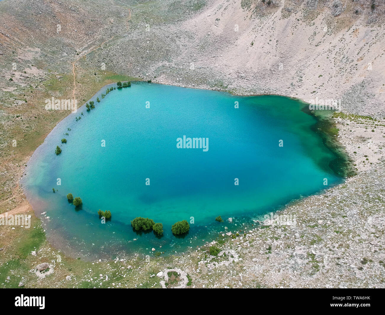 View from above of Green Lake, Turkey. Submerged trees in aqua blue ...