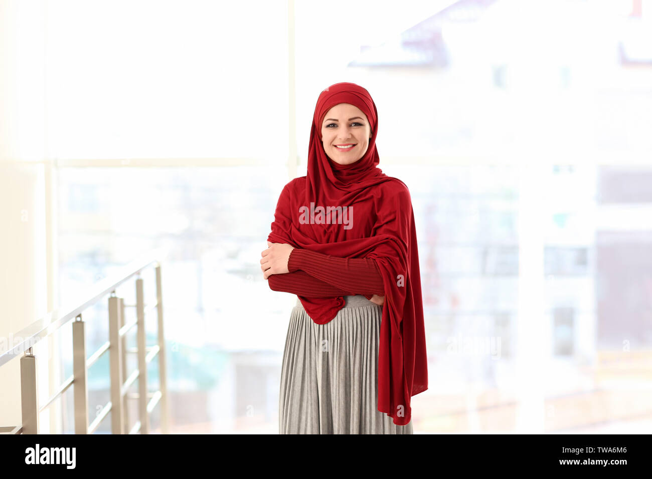 Muslim businesswoman in traditional clothes at workplace Stock Photo ...