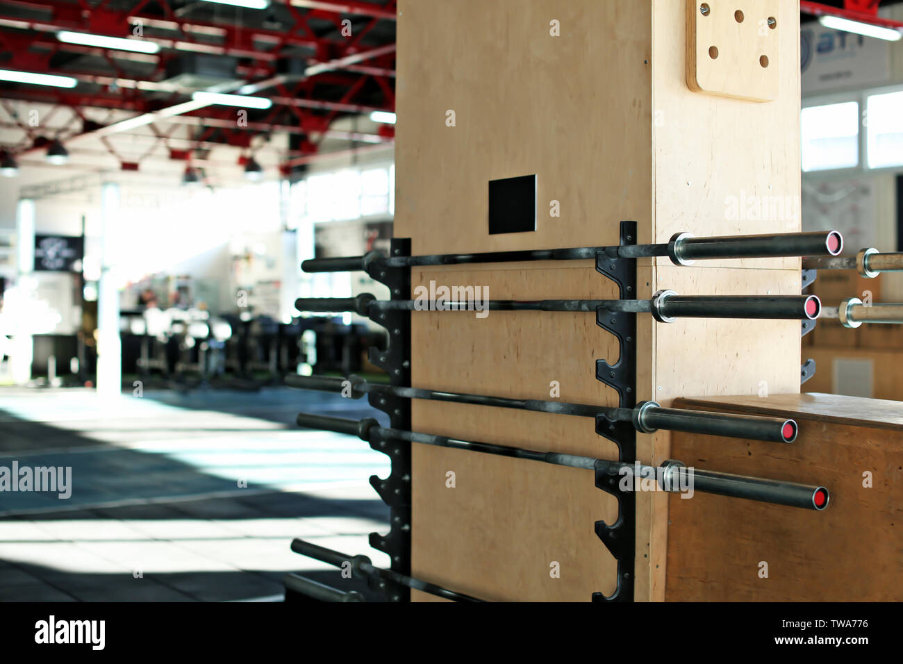 Stand with barbells in gym Stock Photo - Alamy