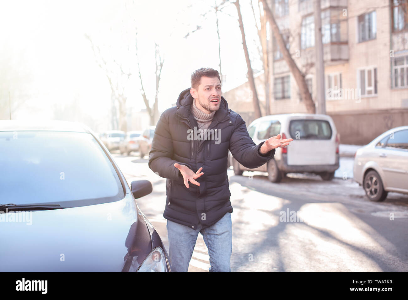 Emotional man in traffic jam on city road Stock Photo - Alamy