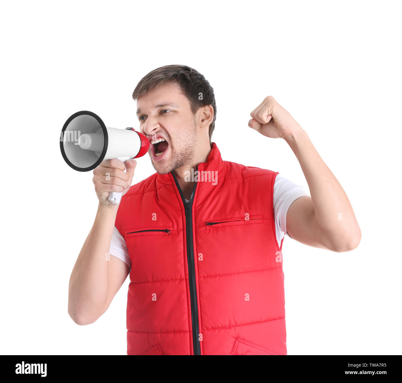 Angry man shouting into megaphone on white background Stock Photo - Alamy