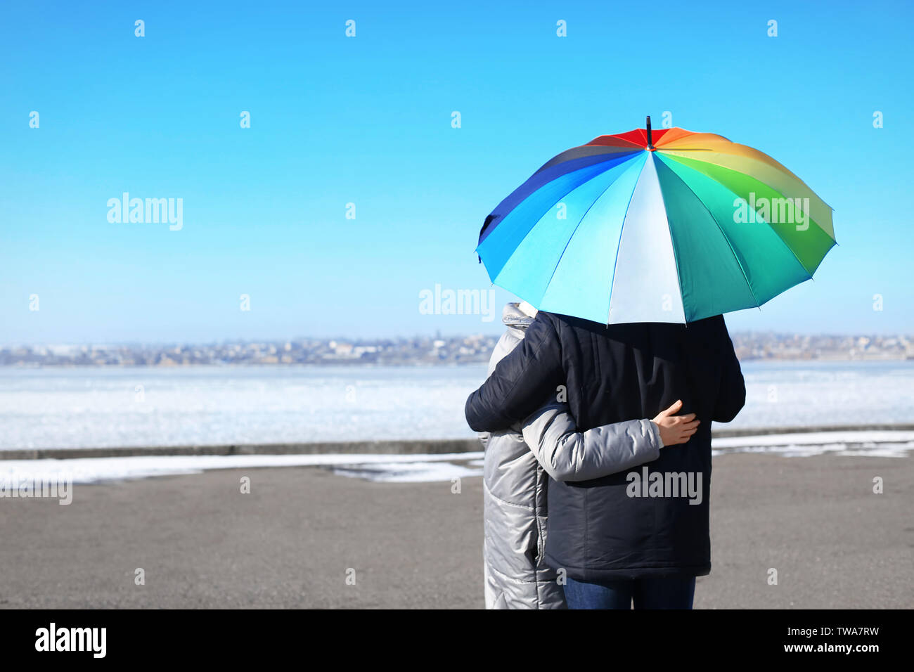 Loving couple on river bank hi-res stock photography and images - Alamy