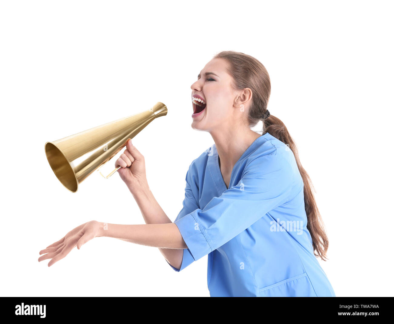 Young female doctor shouting into megaphone on white background Stock ...
