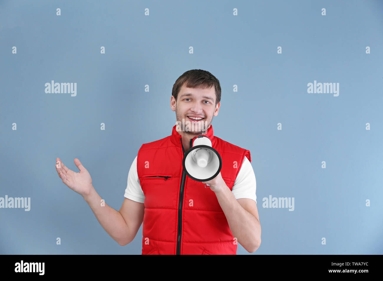 Man in red vest hi-res stock photography and images - Alamy