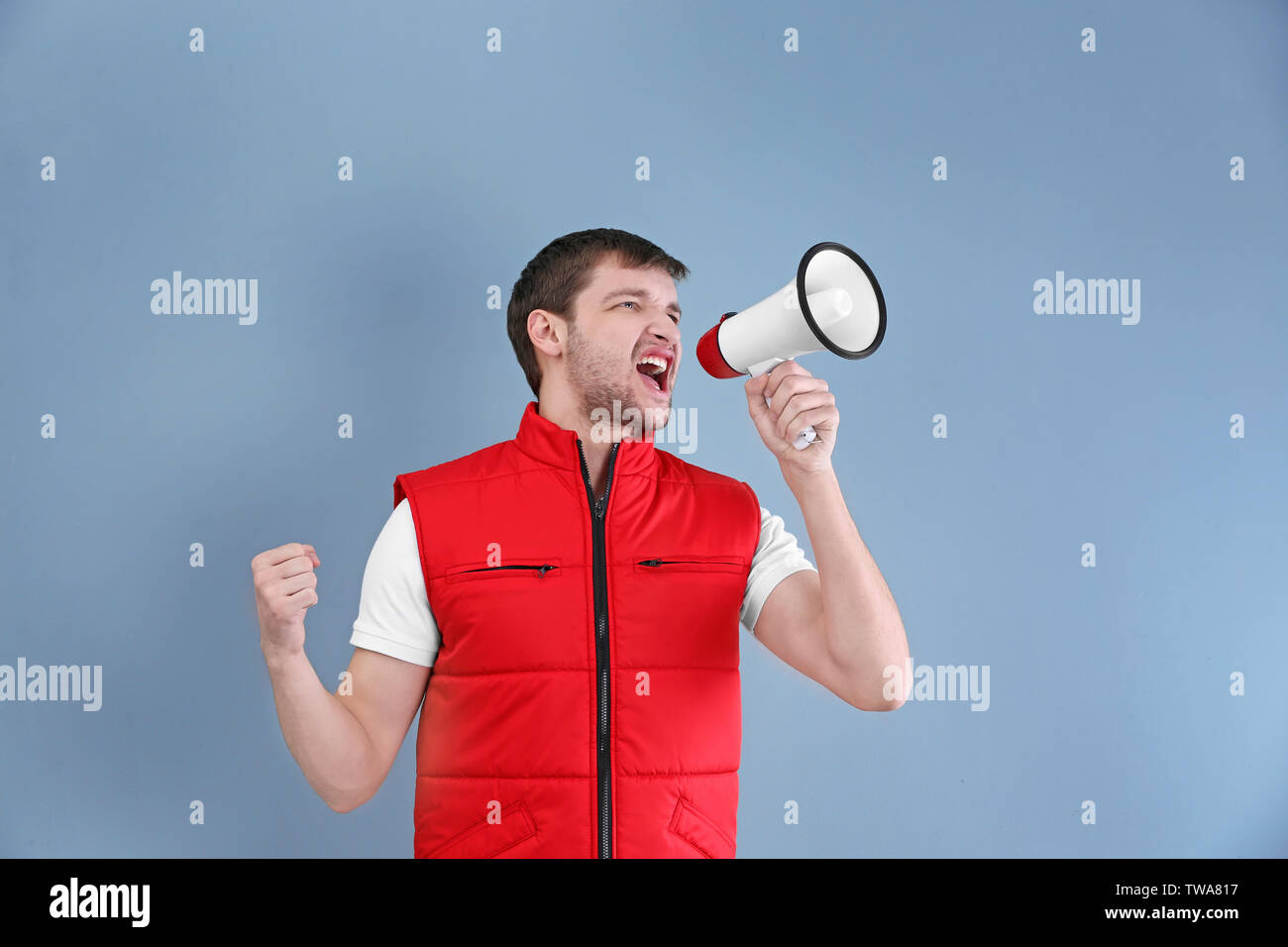 Man in red vest hi-res stock photography and images - Alamy