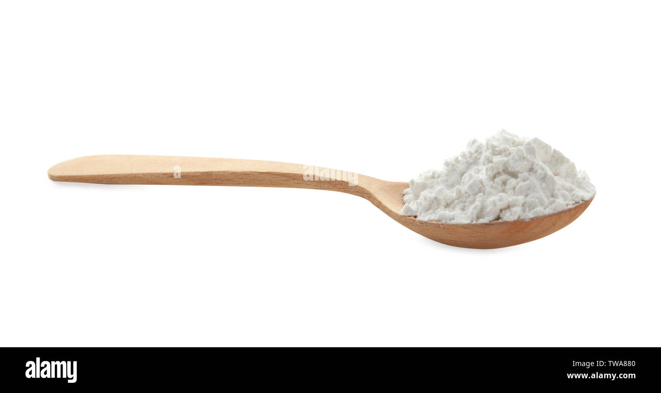 Wooden spoon with corn starch on white background Stock Photo - Alamy