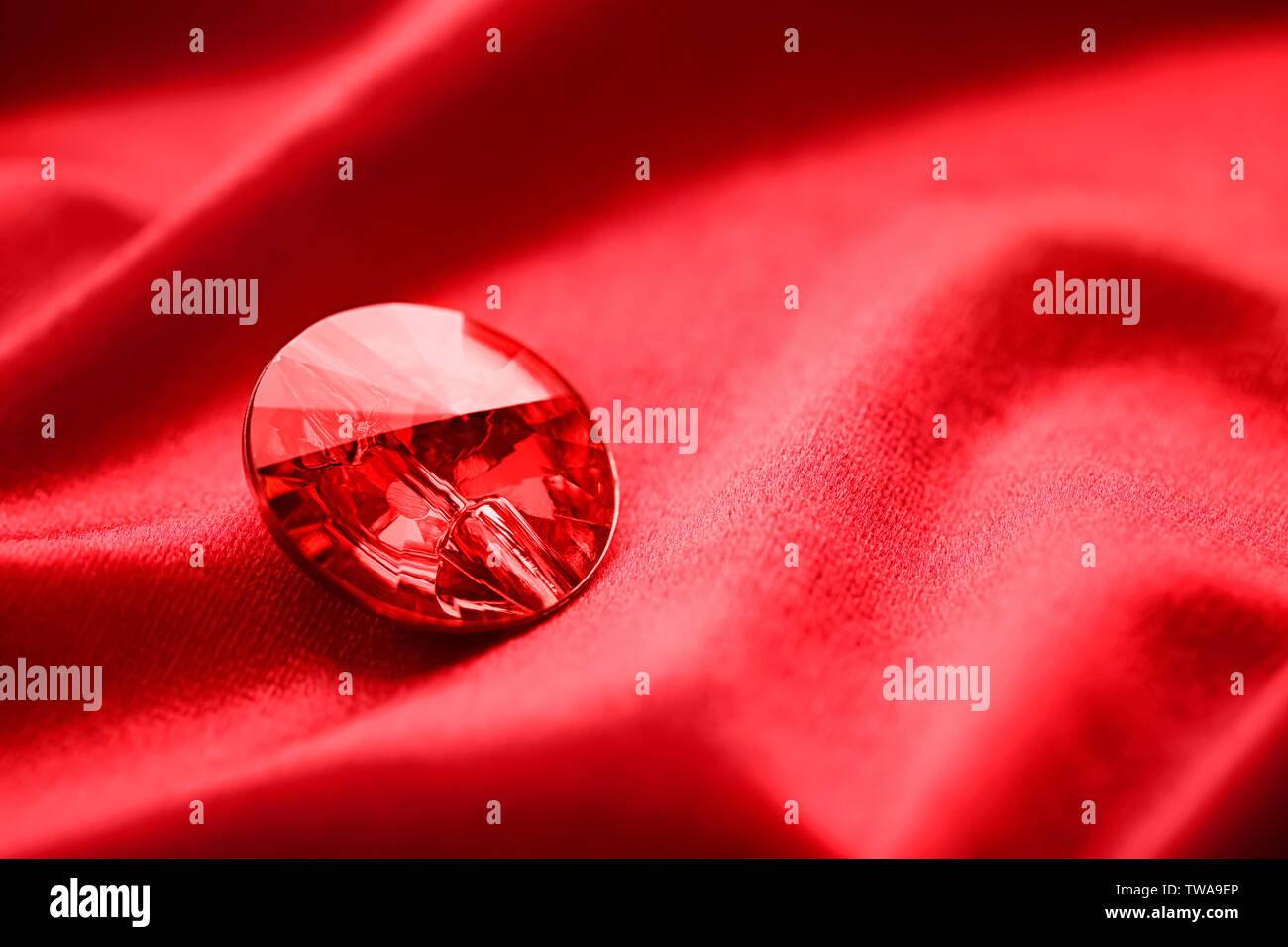 Precious stone for jewellery on red velvet Stock Photo - Alamy