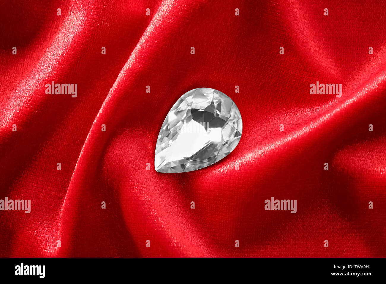 Precious stone for jewellery on red velvet Stock Photo - Alamy