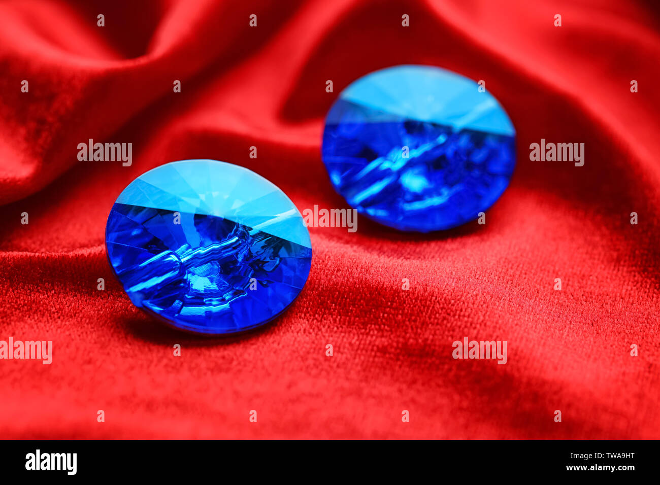 Precious stones for jewellery on red velvet Stock Photo - Alamy