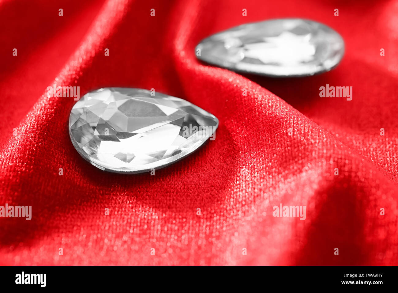 Precious stones for jewellery on red velvet Stock Photo - Alamy