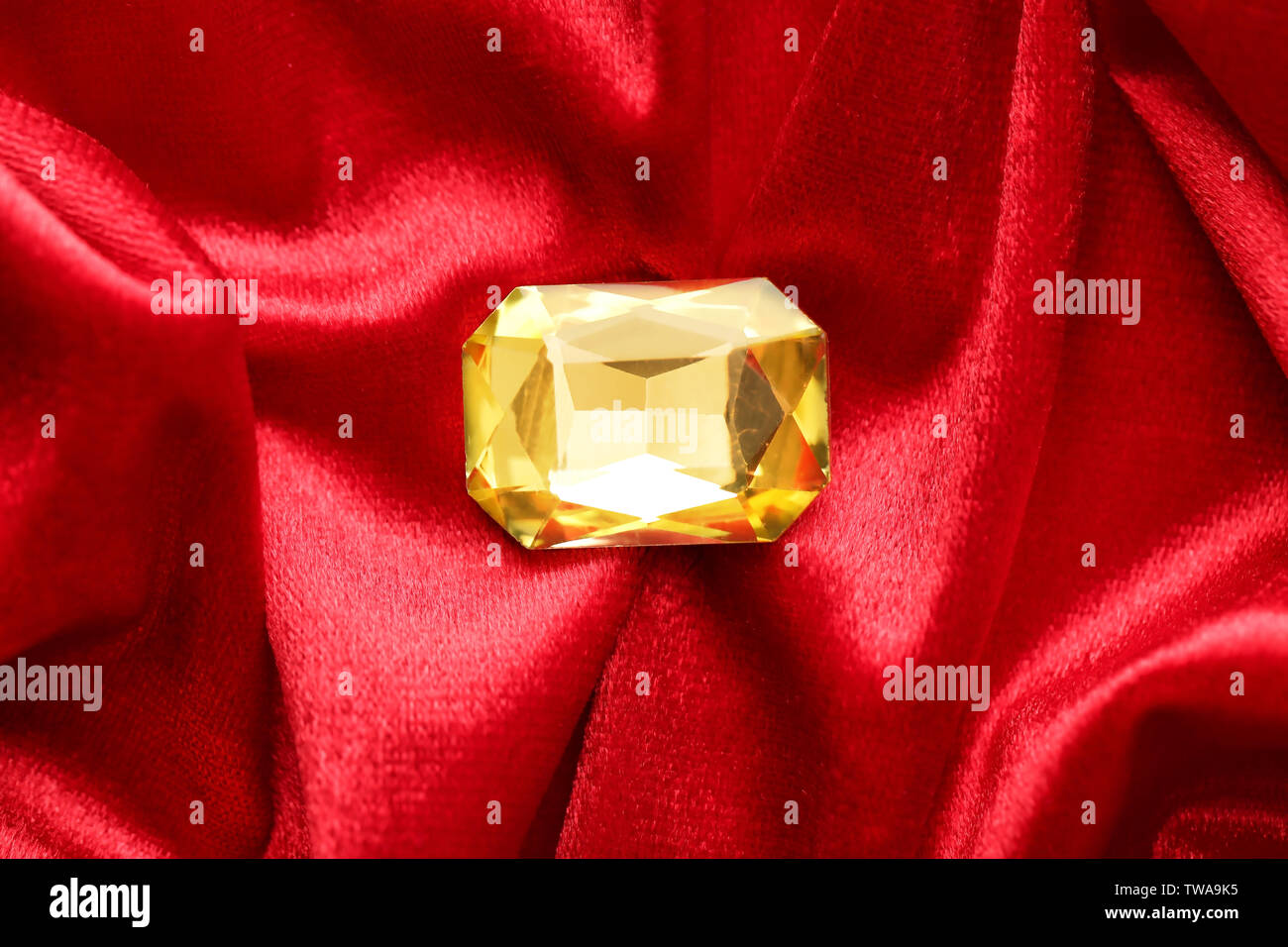 Precious stone for jewellery on red velvet Stock Photo - Alamy