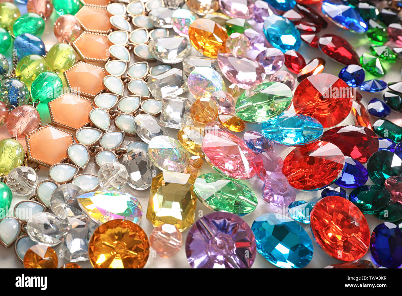 Jewellery with various colorful precious stones Stock Photo - Alamy