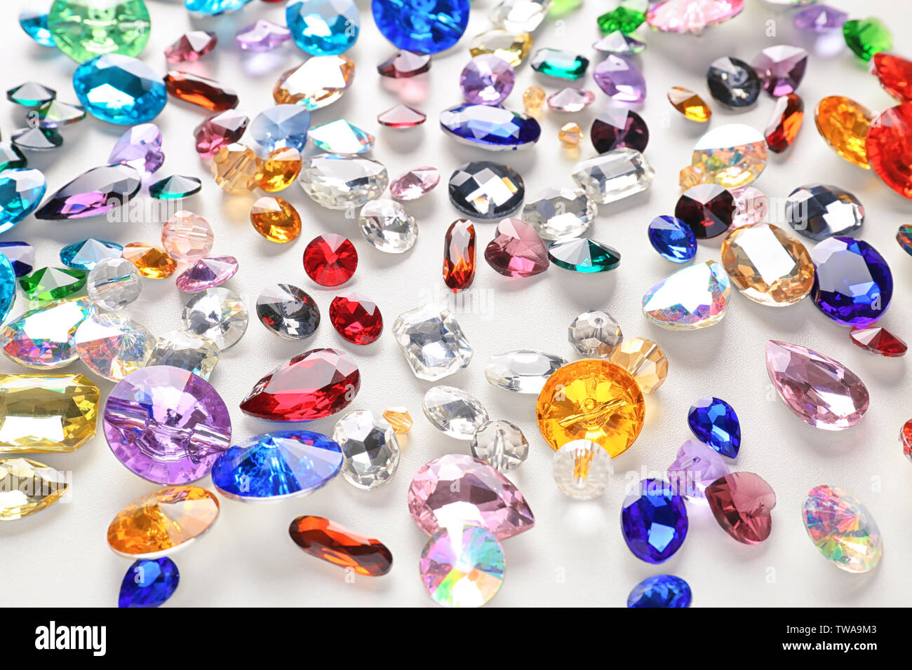 Colorful precious stones for jewellery on white background Stock Photo ...