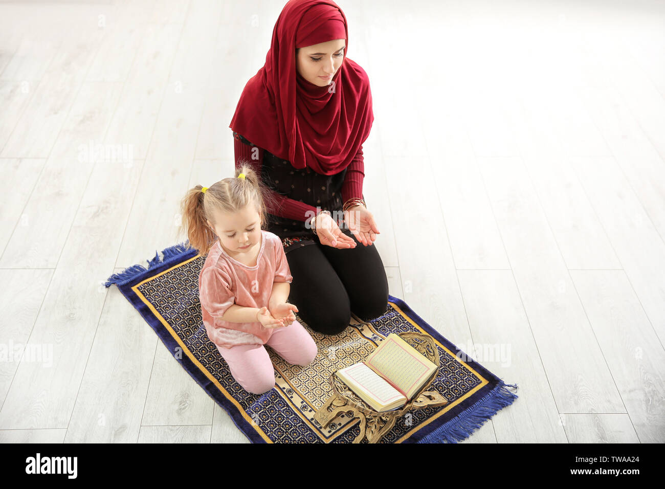 Muslim Woman Praying At Home