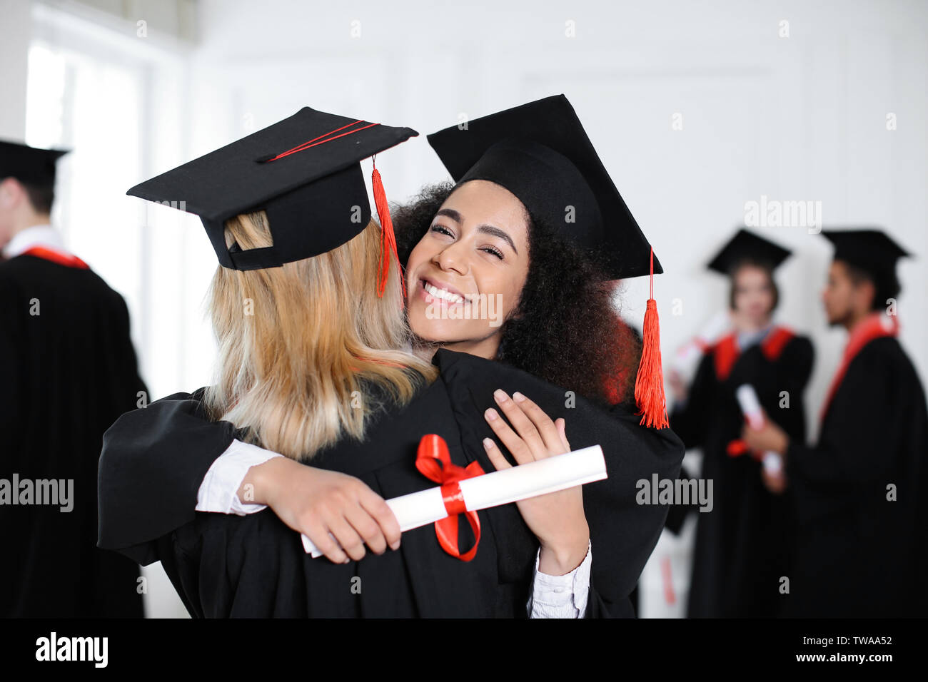 Graduation robes, cap and diploma High Resolution Stock Photography and ...