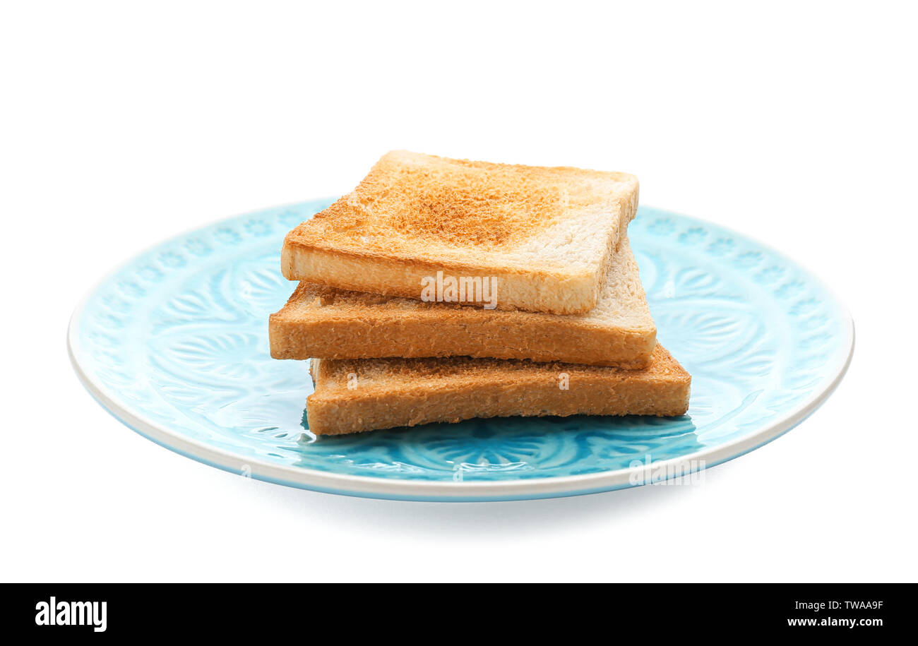 Plate with toasted bread on white background Stock Photo - Alamy