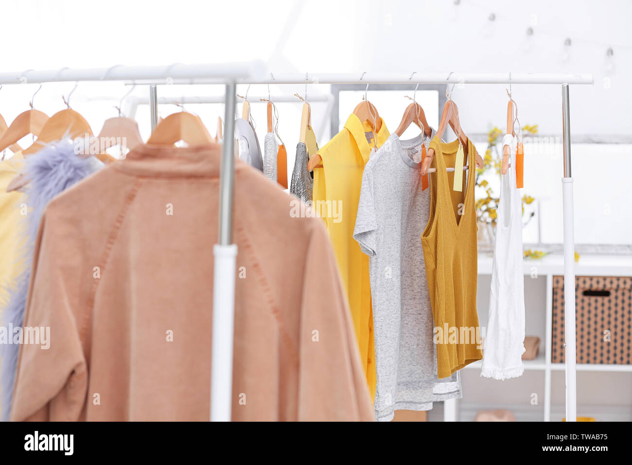 Different women wear in modern shop Stock Photo - Alamy