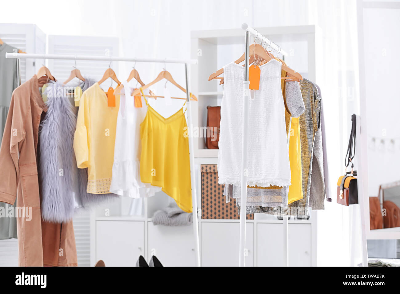 Different women wear in modern shop Stock Photo - Alamy