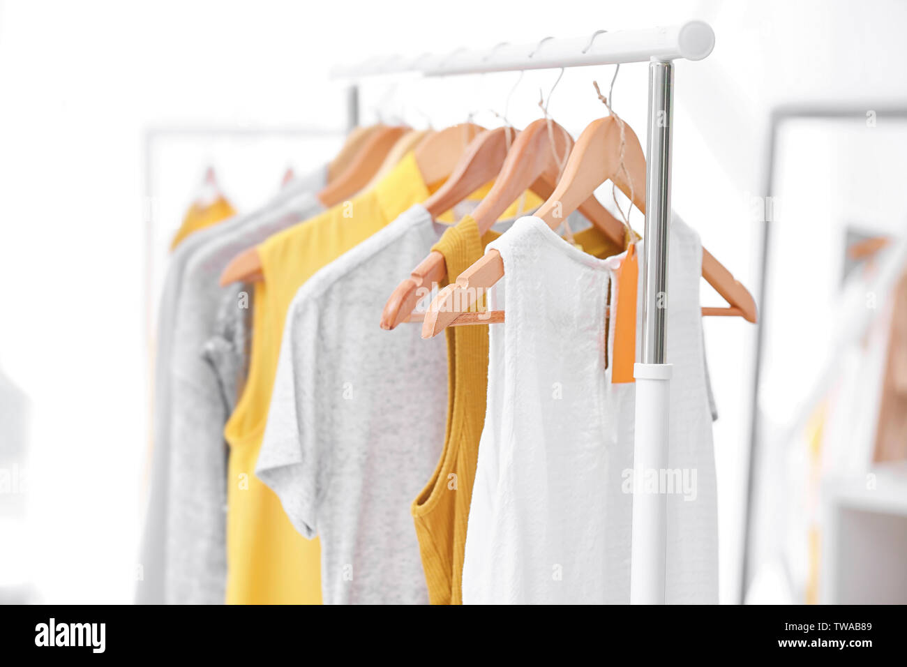 Different women wear in modern shop Stock Photo - Alamy