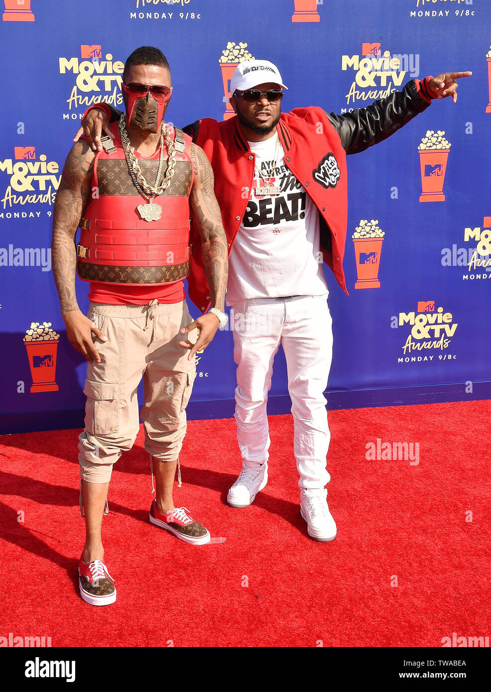 SANTA MONICA, CA - JUNE 15: Nick Cannon (L) and DJ D-WREK attend the ...