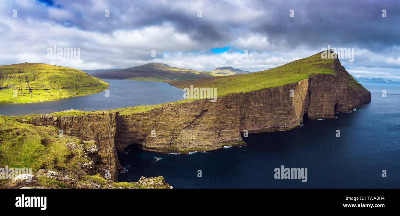 Huge cliff and lake Sorvagsvatn on island of Vagar, Faroe Islands ...