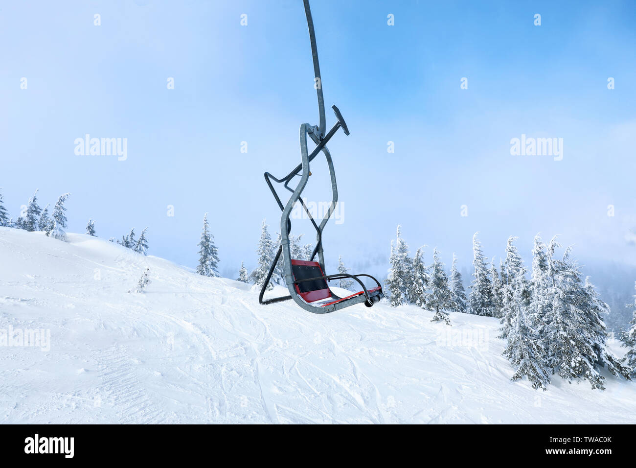 Ski lift at mountain resort. Winter vacation Stock Photo - Alamy