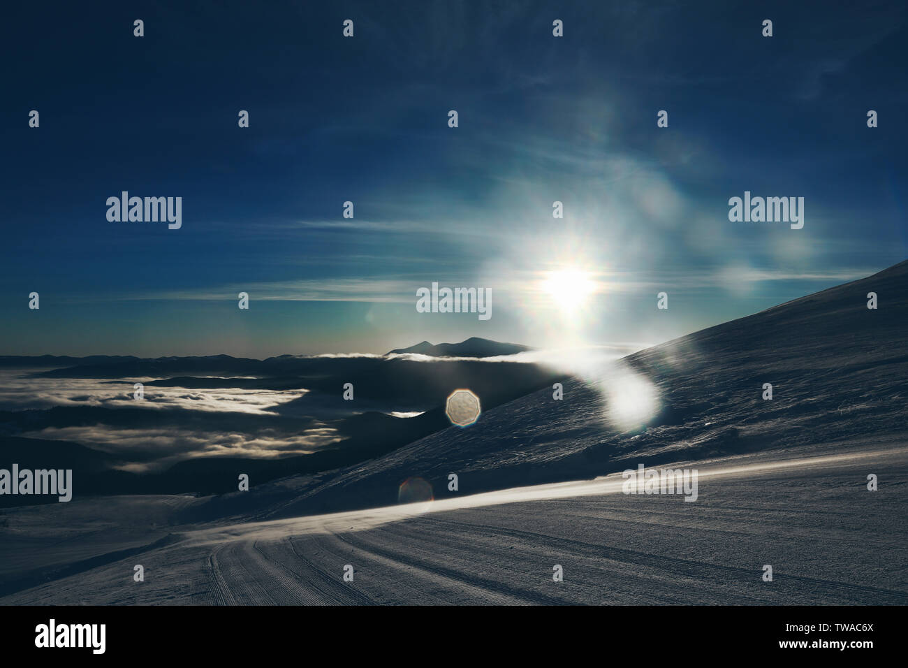 Ski slope at snowy resort in the morning. Winter vacation Stock Photo ...