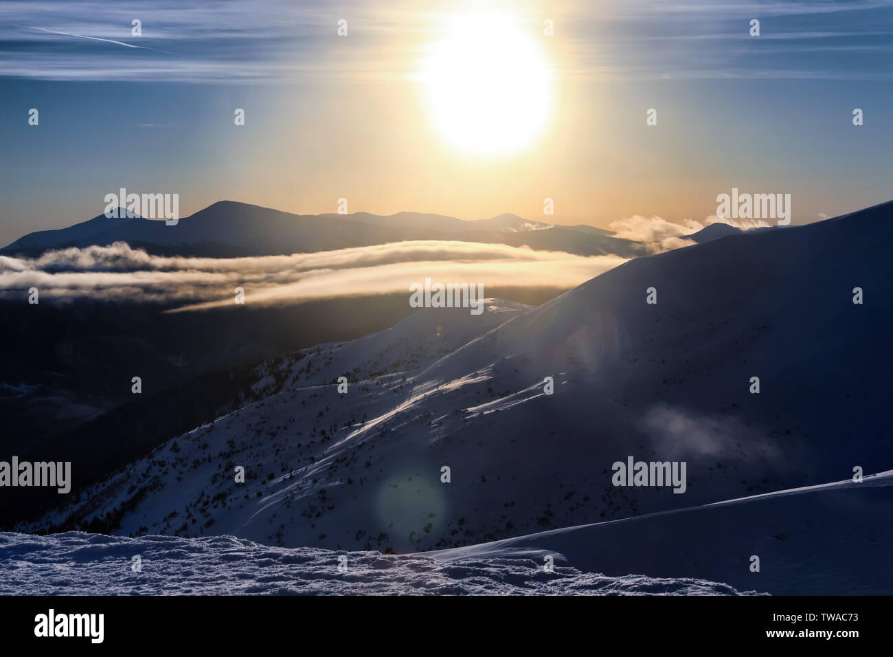 Beautiful snowy mountains in winter morning Stock Photo - Alamy